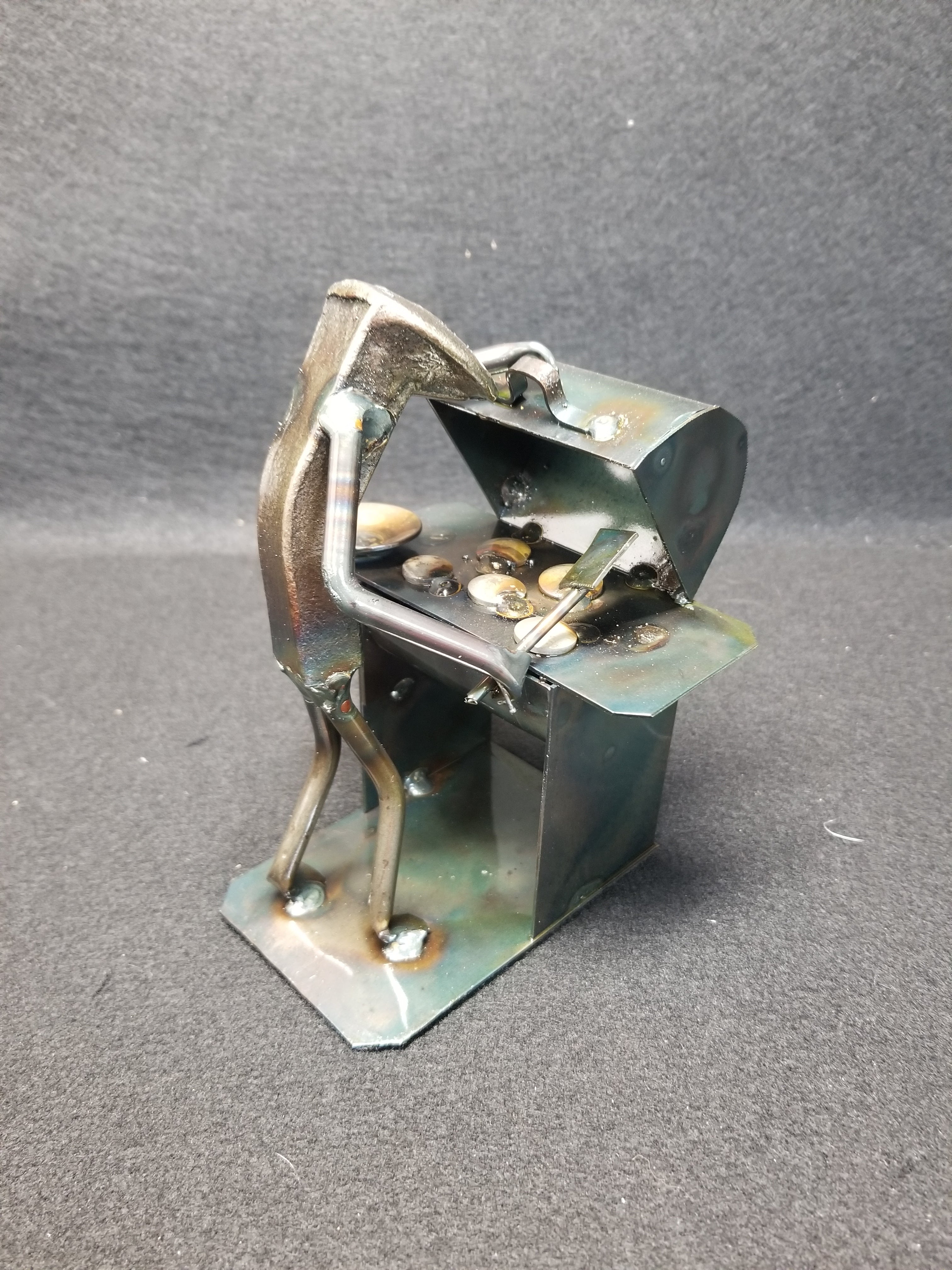 Handcrafted Railroad Spike Art and Metal Sculptures | Roland Metal Art