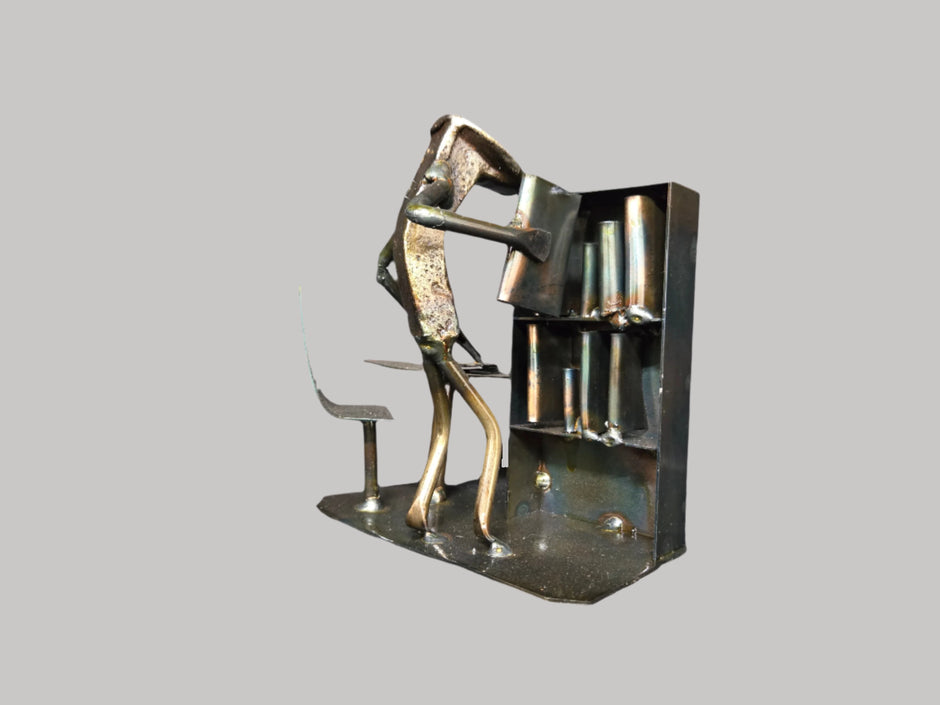 Handcrafted Railroad Spike Art and Metal Sculptures | Roland Metal Art