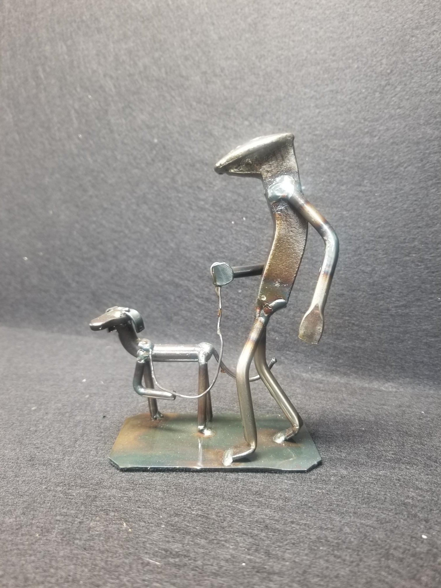 Handcrafted Railroad Spike Art and Metal Sculptures | Roland Metal Art