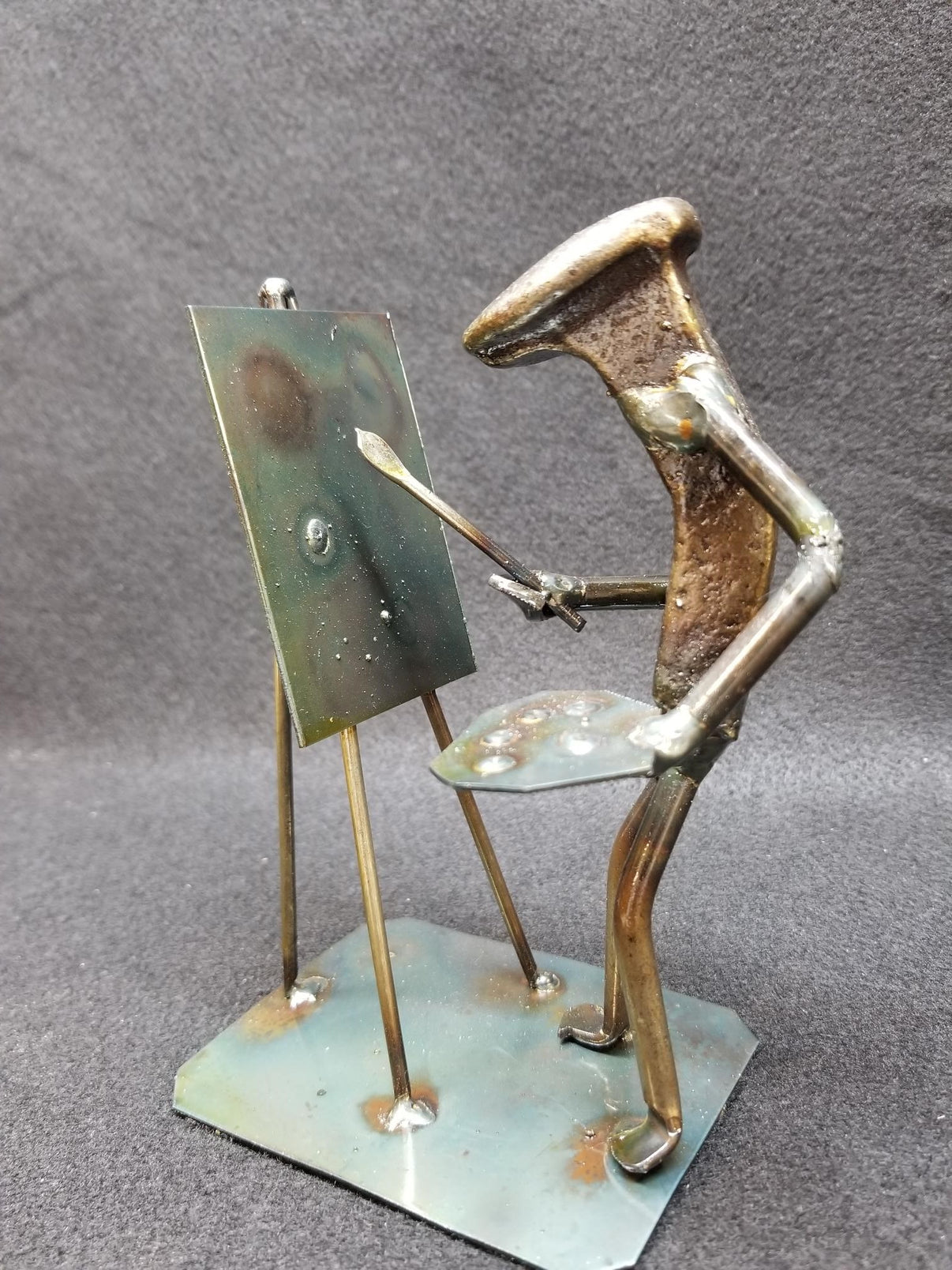 Artist - Painter Railroad Spike Sculpture | Roland Metal Art