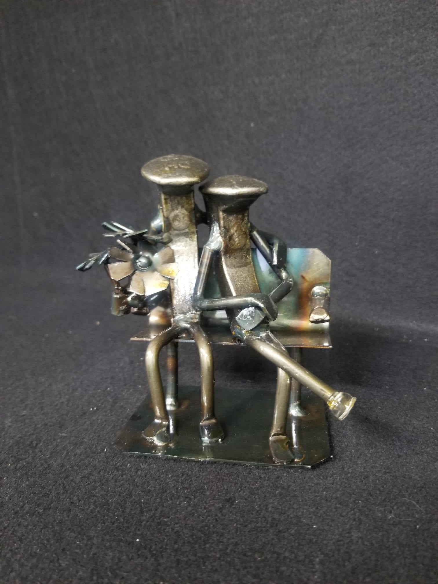 Handcrafted Railroad Spike Art and Metal Sculptures | Roland Metal Art