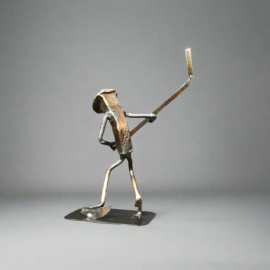 Handcrafted Railroad Spike Art and Metal Sculptures | Roland Metal Art