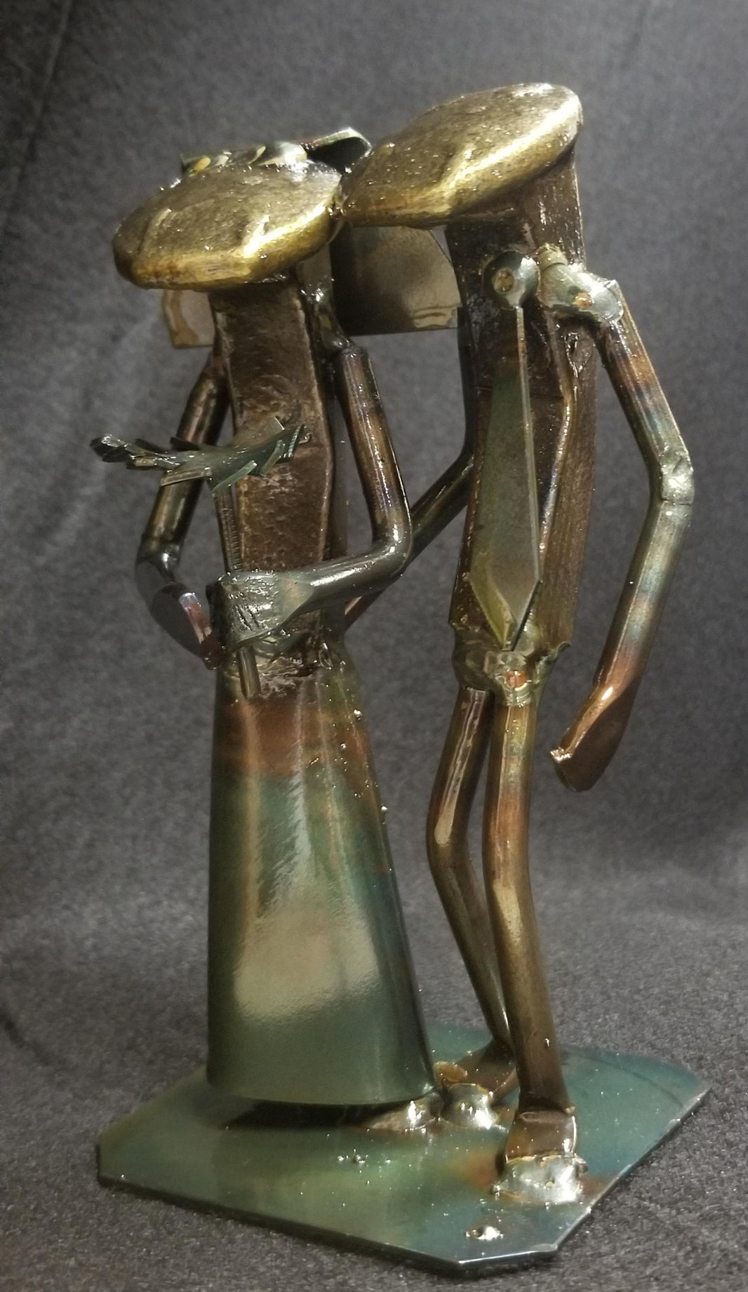 Handcrafted Railroad Spike Art and Metal Sculptures | Roland Metal Art