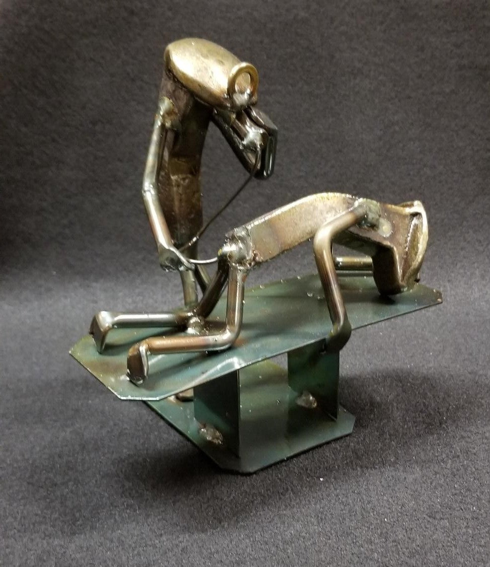 Proctologist - Quirky Railroad Spike Sculpture – Roland Metal Art